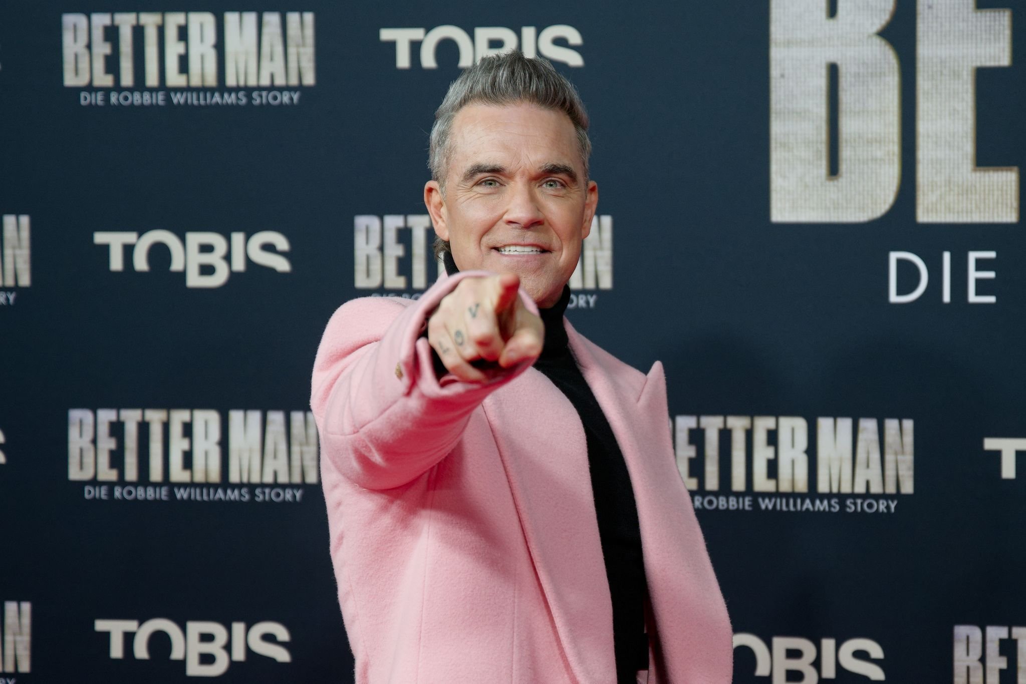 Neu im Kino: „Better Man“ - Robbie Williams als Affe und „Arschloch“